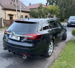 Black Opel Insignia 2014 in Riga, with an engine capacity of 2.00 L and mileage of 139 thousand km for 7900 €, photo 6 on AUTOMOTO.COM.LV