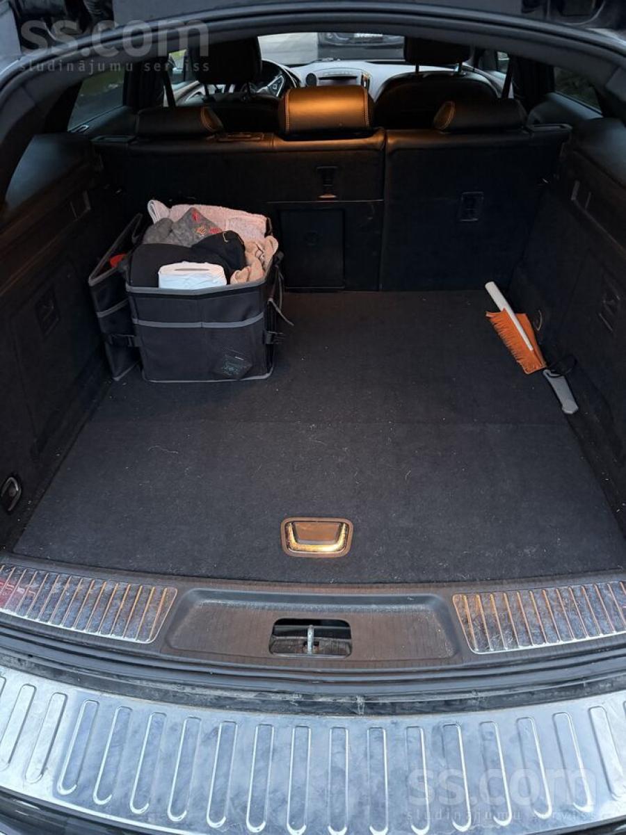 Black Opel Insignia 2014 in Riga, with an engine capacity of 2.00 L and mileage of 139 thousand km for 7900 €, photo 7 on AUTOMOTO.COM.LV