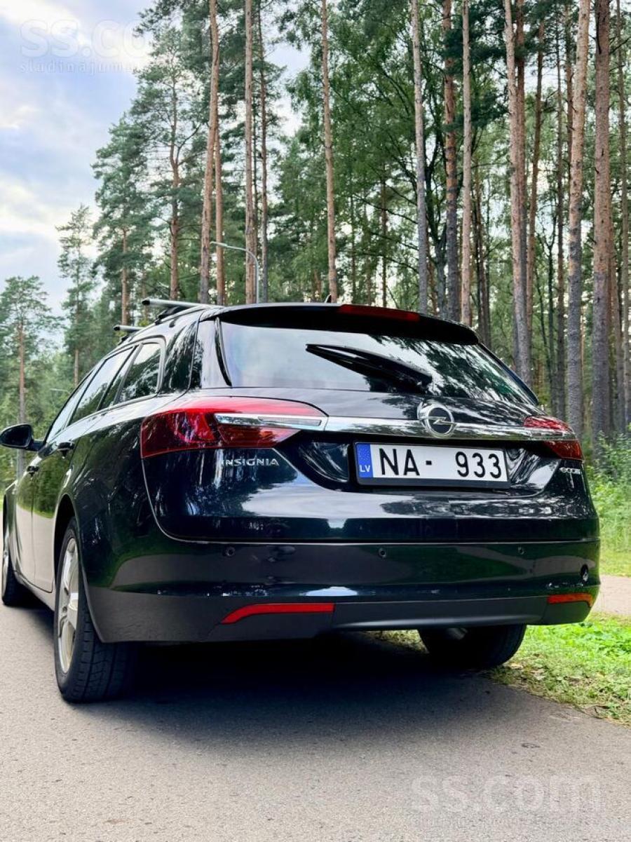 Black Opel Insignia 2014 in Riga, with an engine capacity of 2.00 L and mileage of 317 thousand km for 4000 €, photo 4 on AUTOMOTO.COM.LV