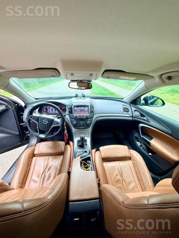 Black Opel Insignia 2014 in Riga, with an engine capacity of 2.00 L and mileage of 317 thousand km for 4000 €, photo 6 on AUTOMOTO.COM.LV