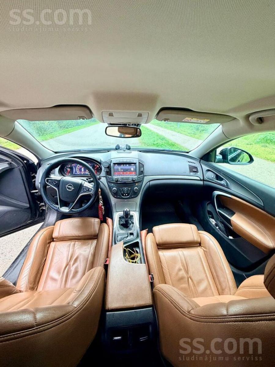 Black Opel Insignia 2014 in Riga, with an engine capacity of 2.00 L and mileage of 317 thousand km for 4000 €, photo 6 on AUTOMOTO.COM.LV