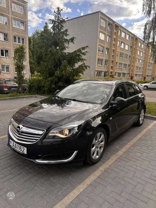 Opel Insignia 2014 in Kaunas on AUTOMOTO.COM.LV Black Opel Insignia 2014 in Kaunas, with an engine capacity of 1.96 L and mileage of 290 thousand km for 5100 β¬, photo 4 on AUTOMOTO.COM.LV