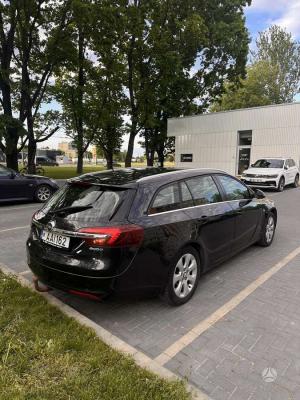 Black Opel Insignia 2014 in Kaunas, with an engine capacity of 1.96 L and mileage of 290 thousand km for 5100 €, photo 7 on AUTOMOTO.COM.LV