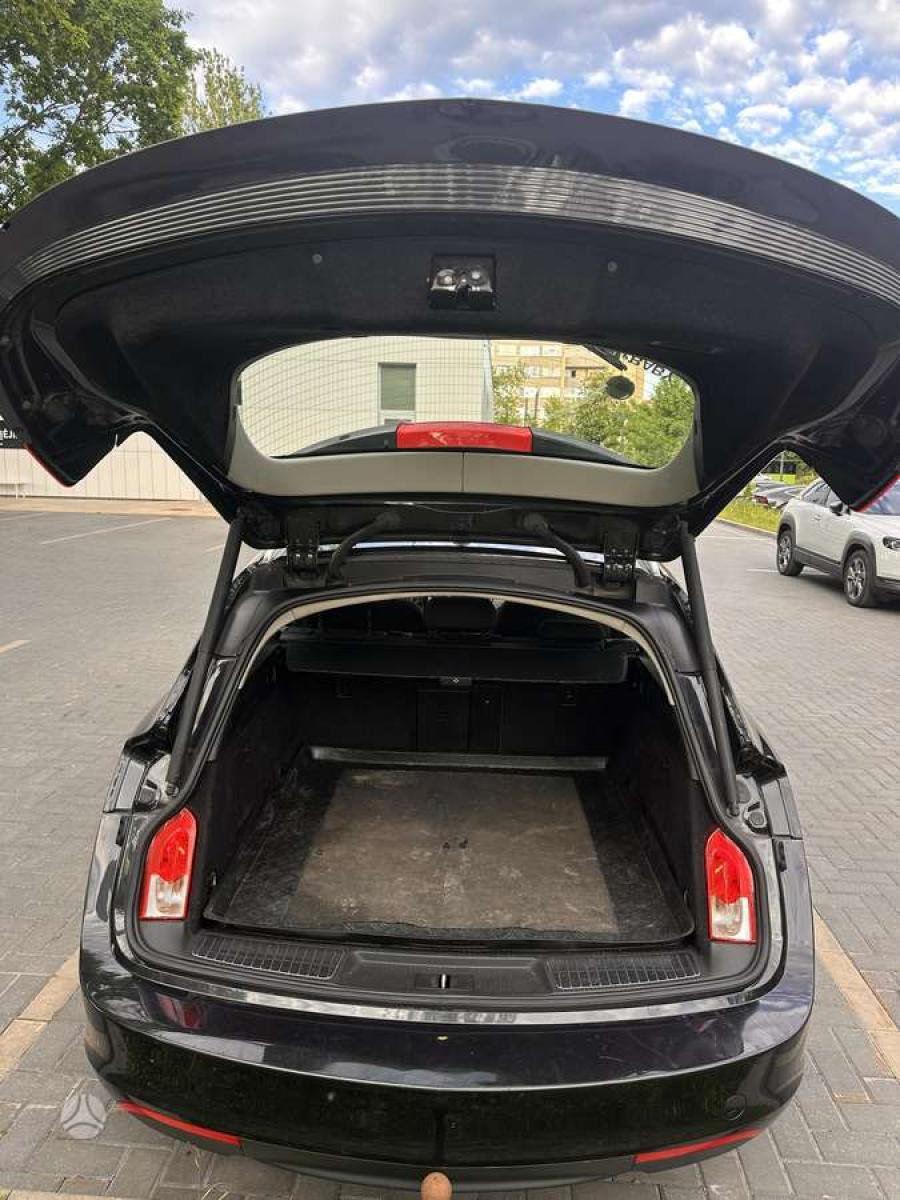 Black Opel Insignia 2014 in Kaunas, with an engine capacity of 1.96 L and mileage of 290 thousand km for 5100 €, photo 12 on AUTOMOTO.COM.LV