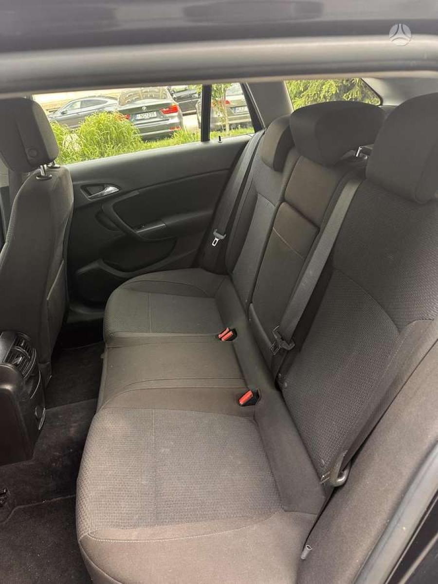Black Opel Insignia 2014 in Kaunas, with an engine capacity of 1.96 L and mileage of 290 thousand km for 5100 €, photo 14 on AUTOMOTO.COM.LV