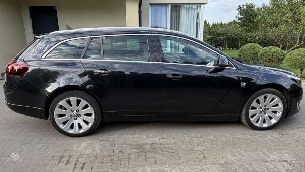 Black Opel Insignia 2014 in Alytus, with an engine capacity of 1.96 L and mileage of 188 thousand km for 5900 €, photo 5 on AUTOMOTO.COM.LV