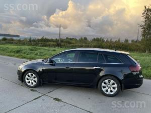 Melns Opel Insignia 2014 Rīga, ar dzinēja tilpumu 2.00 L un nobraukumu 355 tūkst. km par 4400 €, foto 8 vietnē AUTOMOTO.COM.LV