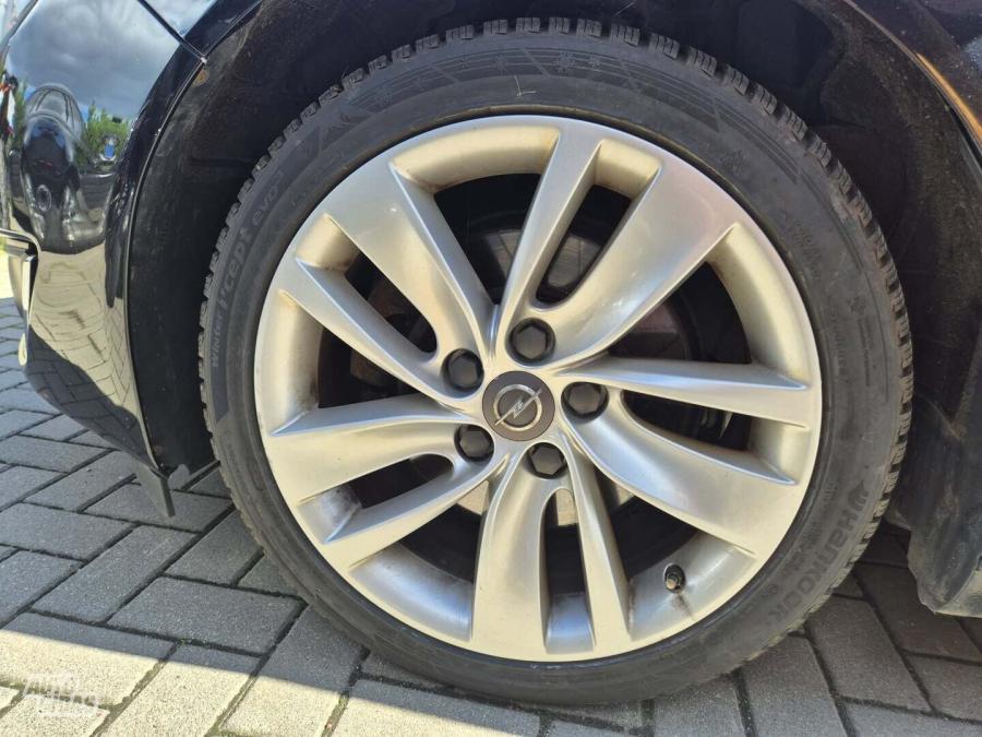 Black Opel Insignia 2014 in Kaunas, with an engine capacity of 2.00 L and mileage of 197 thousand km for 5250 €, photo 33 on AUTOMOTO.COM.LV