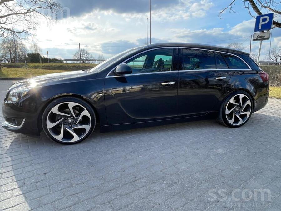 Black Opel Insignia 2015 in Ogre, with an engine capacity of 2.00 L and mileage of 262 thousand km for 7595 €, photo 5 on AUTOMOTO.COM.LV