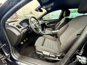 Black Opel Insignia 2015 in Riga, with an engine capacity of 2.00 L and mileage of 0 thousand km for 6750 €, photo 8 on AUTOMOTO.COM.LV