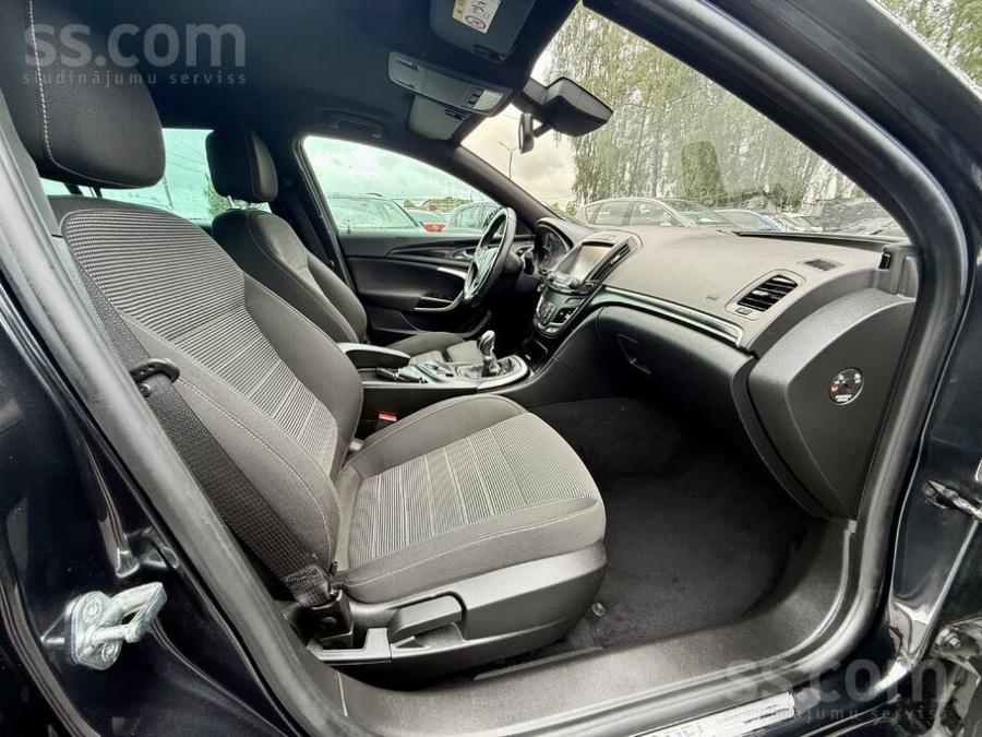 Black Opel Insignia 2015 in Riga, with an engine capacity of 2.00 L and mileage of 0 thousand km for 6750 €, photo 12 on AUTOMOTO.COM.LV