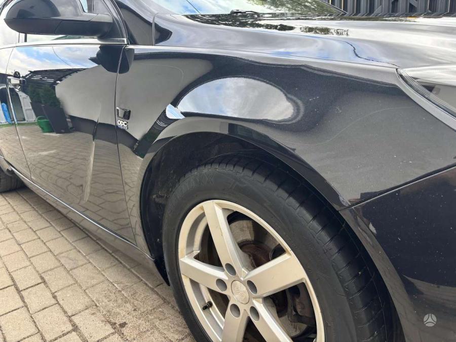 Black Opel Insignia 2015 in Vilnius, with an engine capacity of 1.96 L and mileage of 303 thousand km for 5200 €, photo 12 on AUTOMOTO.COM.LV