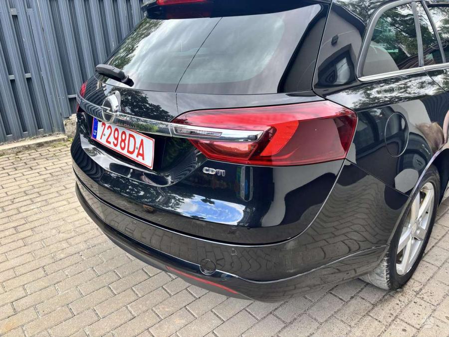 Black Opel Insignia 2015 in Vilnius, with an engine capacity of 1.96 L and mileage of 303 thousand km for 5200 €, photo 13 on AUTOMOTO.COM.LV