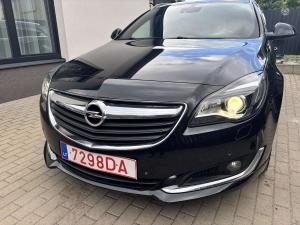 Black Opel Insignia 2015 in Vilnius, with an engine capacity of 1.96 L and mileage of 303 thousand km for 5200 €, photo 14 on AUTOMOTO.COM.LV