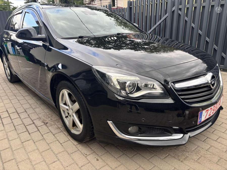 Black Opel Insignia 2015 in Vilnius, with an engine capacity of 1.96 L and mileage of 303 thousand km for 5200 €, photo 16 on AUTOMOTO.COM.LV