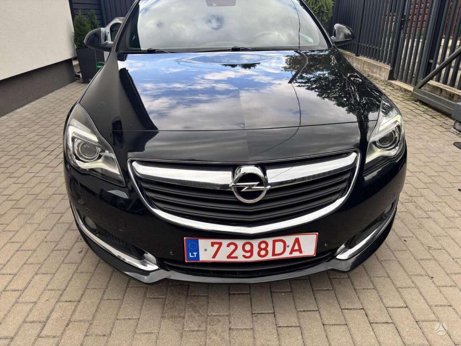 Black Opel Insignia 2015 in Vilnius, with an engine capacity of 1.96 L and mileage of 303 thousand km for 5200 €, photo 17 on AUTOMOTO.COM.LV