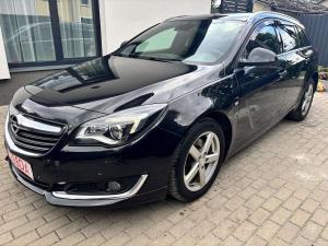 Black Opel Insignia 2015 in Vilnius, with an engine capacity of 1.96 L and mileage of 303 thousand km for 5200 €, photo 18 on AUTOMOTO.COM.LV