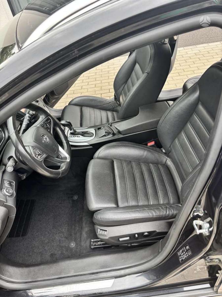 Black Opel Insignia 2015 in Vilnius, with an engine capacity of 1.96 L and mileage of 303 thousand km for 5200 €, photo 26 on AUTOMOTO.COM.LV