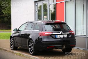 Black Opel Insignia 2015 in Riga, with an engine capacity of 2.00 L and mileage of 295 thousand km for 4995 €, photo 6 on AUTOMOTO.COM.LV