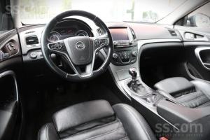 Black Opel Insignia 2015 in Riga, with an engine capacity of 2.00 L and mileage of 295 thousand km for 4995 €, photo 9 on AUTOMOTO.COM.LV