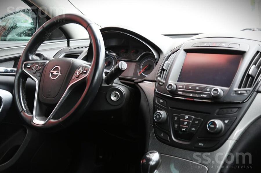 Black Opel Insignia 2015 in Riga, with an engine capacity of 2.00 L and mileage of 295 thousand km for 4995 €, photo 12 on AUTOMOTO.COM.LV