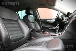 Black Opel Insignia 2015 in Riga, with an engine capacity of 2.00 L and mileage of 295 thousand km for 4995 €, photo 14 on AUTOMOTO.COM.LV