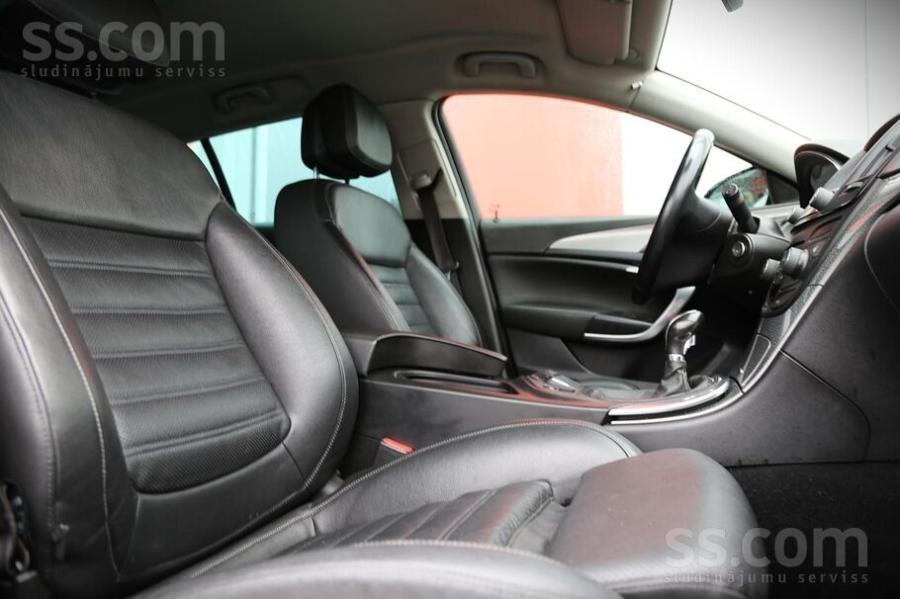 Black Opel Insignia 2015 in Riga, with an engine capacity of 2.00 L and mileage of 295 thousand km for 4995 €, photo 14 on AUTOMOTO.COM.LV