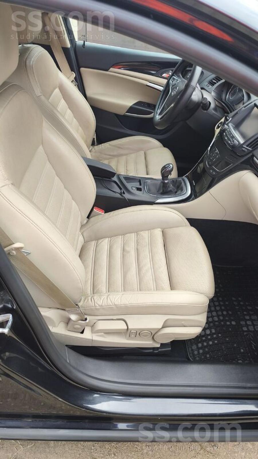 Black Opel Insignia 2015 in Riga, with an engine capacity of 2.00 L and mileage of 263 thousand km for 6700 €, photo 11 on AUTOMOTO.COM.LV