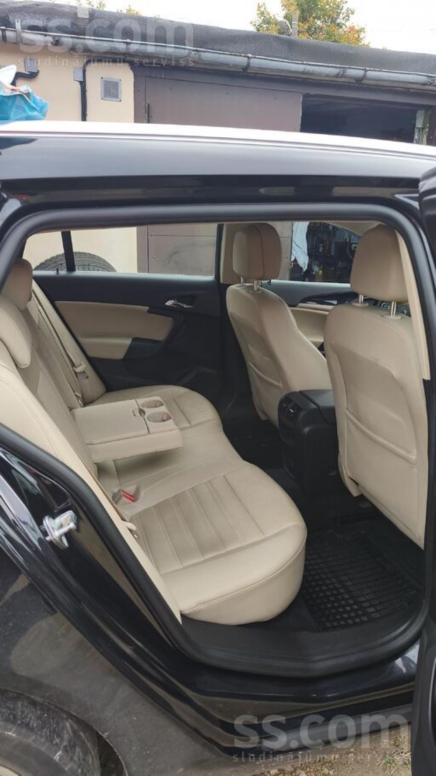 Black Opel Insignia 2015 in Riga, with an engine capacity of 2.00 L and mileage of 263 thousand km for 6700 €, photo 12 on AUTOMOTO.COM.LV