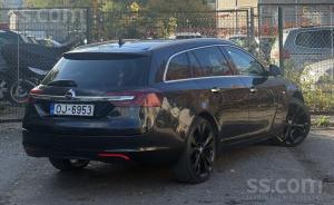Black Opel Insignia 2015 in Riga, with an engine capacity of 2.00 L and mileage of 0 thousand km for 3990 €, photo 5 on AUTOMOTO.COM.LV