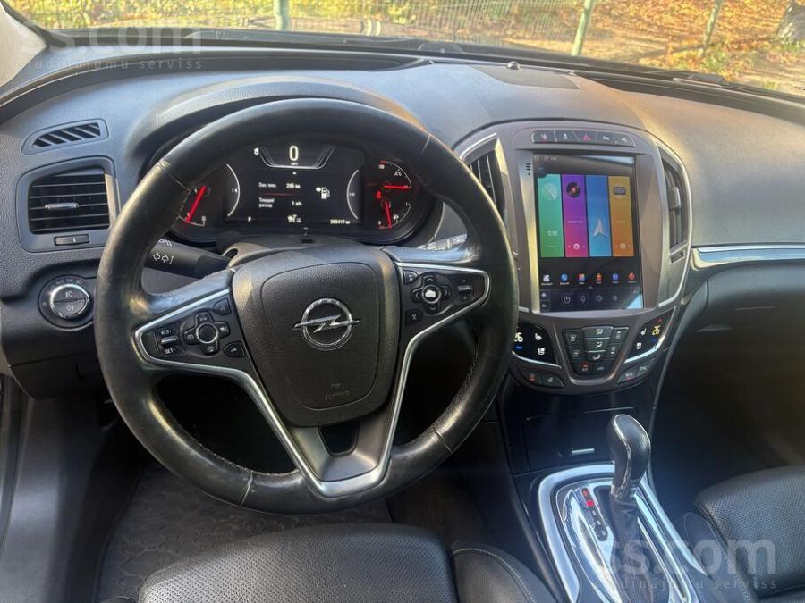 Black Opel Insignia 2015 in Riga, with an engine capacity of 2.00 L and mileage of 0 thousand km for 3990 €, photo 13 on AUTOMOTO.COM.LV