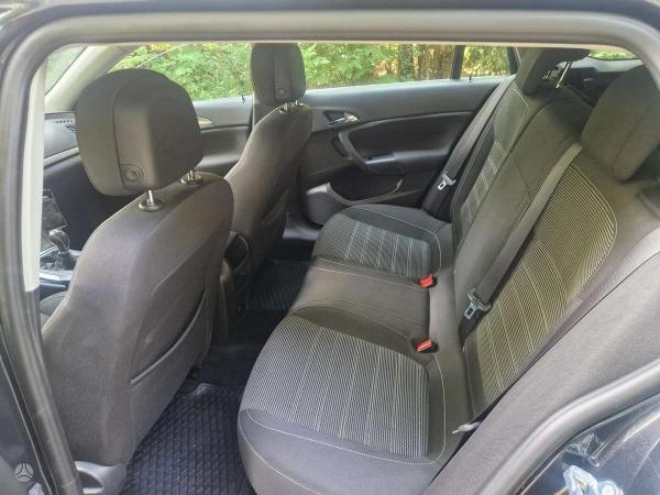 Black Opel Insignia 2016 in Raseiniai, with an engine capacity of 1.60 L and mileage of 171 thousand km for 5200 €, photo 10 on AUTOMOTO.COM.LV