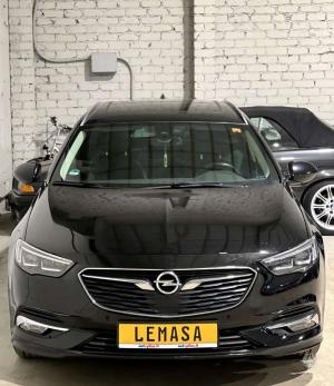 Black Opel Insignia 2017 in Klaipeda, with an engine capacity of 1.96 L and mileage of 241 thousand km for 10999 €, photo 12 on AUTOMOTO.COM.LV