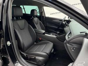 Black Opel Insignia 2017 in Vilnius, with an engine capacity of 1.96 L and mileage of 183 thousand km for 6900 €, photo 9 on AUTOMOTO.COM.LV