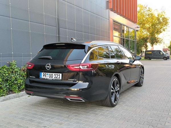 Black Opel Insignia 2017 in Klaipeda, with an engine capacity of 1.96 L and mileage of 220 thousand km for 11950 €, photo 10 on AUTOMOTO.COM.LV