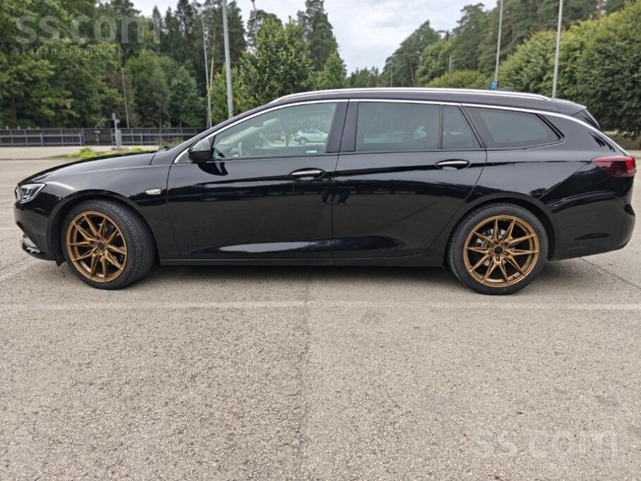Black Opel Insignia 2017 in Ogre, with an engine capacity of 2.00 L and mileage of 250 thousand km for 10350 €, photo 4 on AUTOMOTO.COM.LV