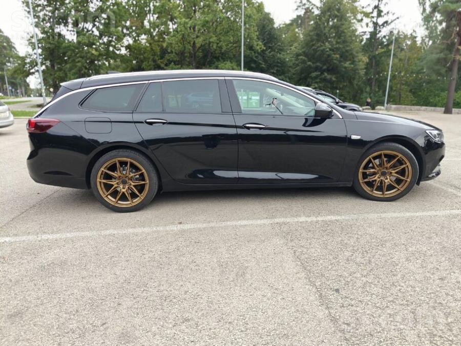 Black Opel Insignia 2017 in Ogre, with an engine capacity of 2.00 L and mileage of 250 thousand km for 10350 €, photo 5 on AUTOMOTO.COM.LV