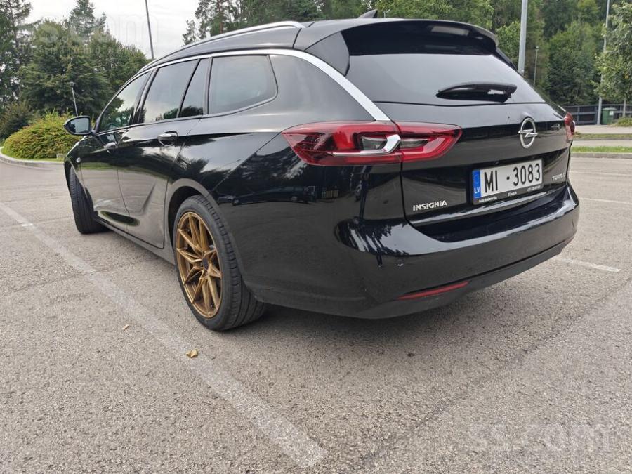 Black Opel Insignia 2017 in Ogre, with an engine capacity of 2.00 L and mileage of 250 thousand km for 10350 €, photo 7 on AUTOMOTO.COM.LV