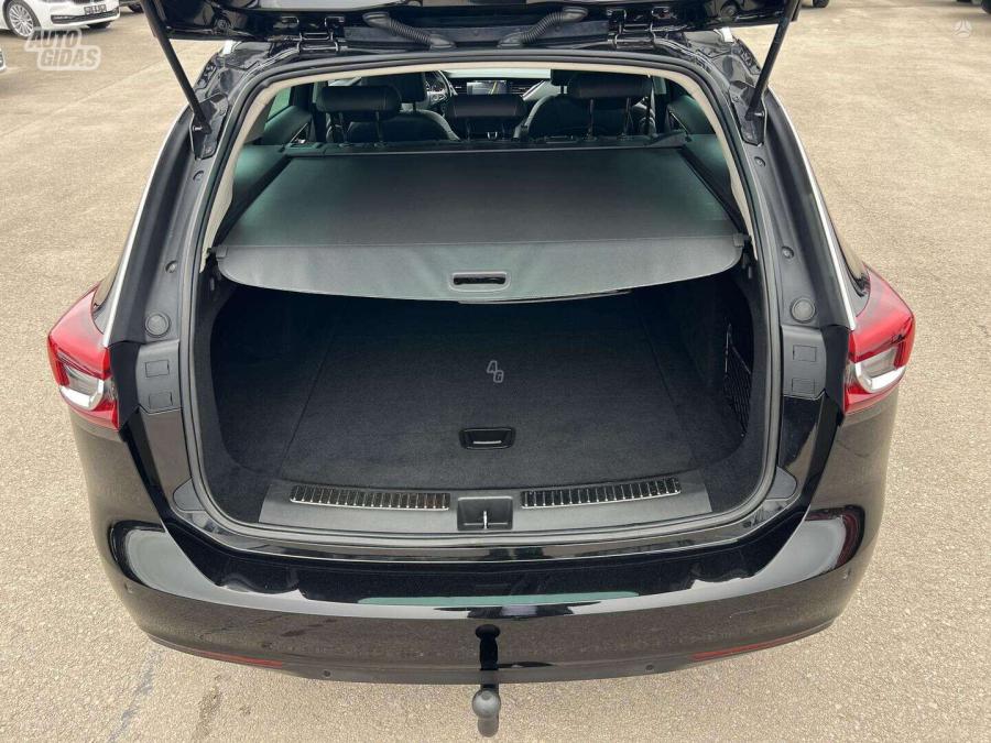 Black Opel Insignia 2018 in Marijampole, with an engine capacity of 2.00 L and mileage of 225 thousand km for 9950 €, photo 14 on AUTOMOTO.COM.LV