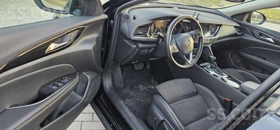 Black Opel Insignia 2019 in Liepaja, with an engine capacity of 2.00 L and mileage of 167 thousand km for 11200 €, photo 11 on AUTOMOTO.COM.LV