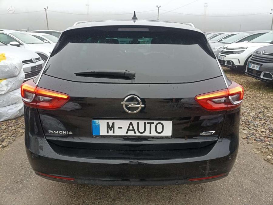 Black Opel Insignia 2019 in Vilnius, with an engine capacity of 1.96 L and mileage of 180 thousand km for 11737 €, photo 4 on AUTOMOTO.COM.LV