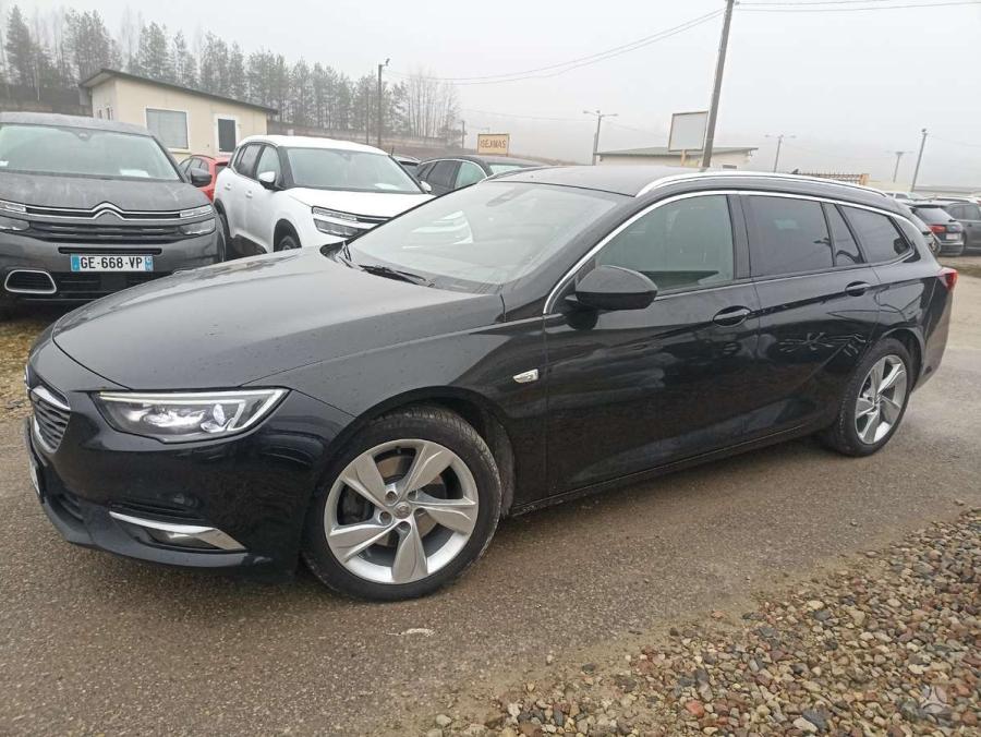 Black Opel Insignia 2019 in Vilnius, with an engine capacity of 1.96 L and mileage of 180 thousand km for 11737 €, photo 6 on AUTOMOTO.COM.LV