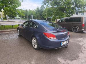Blue Opel Insignia 2009 in Kaunas, with an engine capacity of 1.96 L and mileage of 285 thousand km for 1750 €, photo 4 on AUTOMOTO.COM.LV