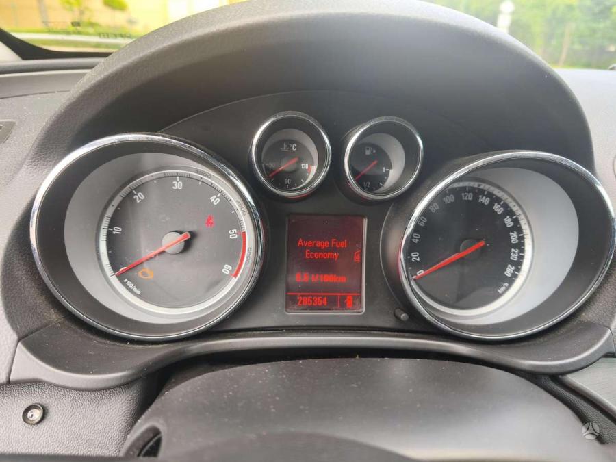 Blue Opel Insignia 2009 in Kaunas, with an engine capacity of 1.96 L and mileage of 285 thousand km for 1750 €, photo 5 on AUTOMOTO.COM.LV