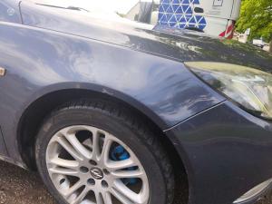Blue Opel Insignia 2009 in Kaunas, with an engine capacity of 1.96 L and mileage of 285 thousand km for 1750 €, photo 12 on AUTOMOTO.COM.LV