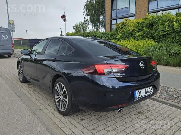 Blue Opel Insignia 2018 in Riga, with an engine capacity of 2.00 L and mileage of 98 thousand km for 13999 €, photo 4 on AUTOMOTO.COM.LV