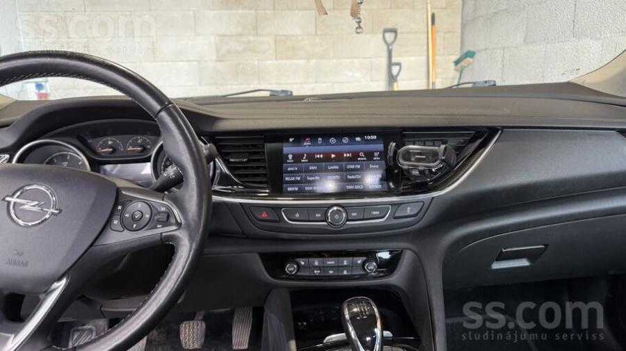 Blue Opel Insignia 2018 in Riga, with an engine capacity of 1.50 L and mileage of 254 thousand km for 11490 €, photo 11 on AUTOMOTO.COM.LV