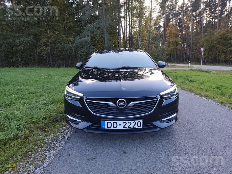 Blue Opel Insignia 2019 in Riga, with an engine capacity of 2.00 L and mileage of 184 thousand km for 10500 €, photo 3 on AUTOMOTO.COM.LV