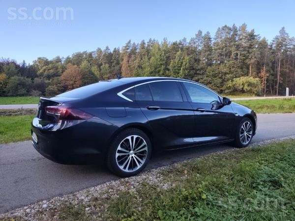 Blue Opel Insignia 2019 in Riga, with an engine capacity of 2.00 L and mileage of 184 thousand km for 10500 €, photo 5 on AUTOMOTO.COM.LV
