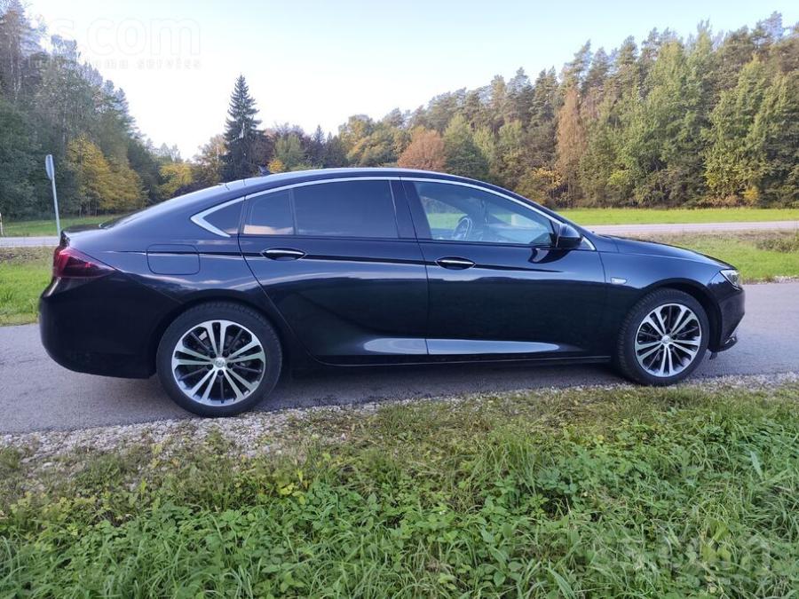 Blue Opel Insignia 2019 in Riga, with an engine capacity of 2.00 L and mileage of 184 thousand km for 10500 €, photo 6 on AUTOMOTO.COM.LV